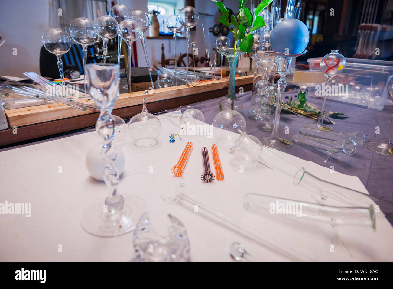 Unfinished hand-blown glass objects in a glassblower manufactory Stock ...