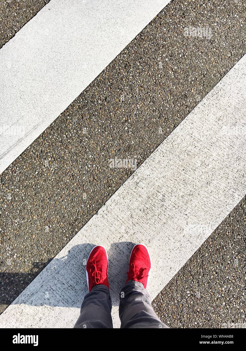 Zebra crossing on red white hi-res stock photography and images - Alamy