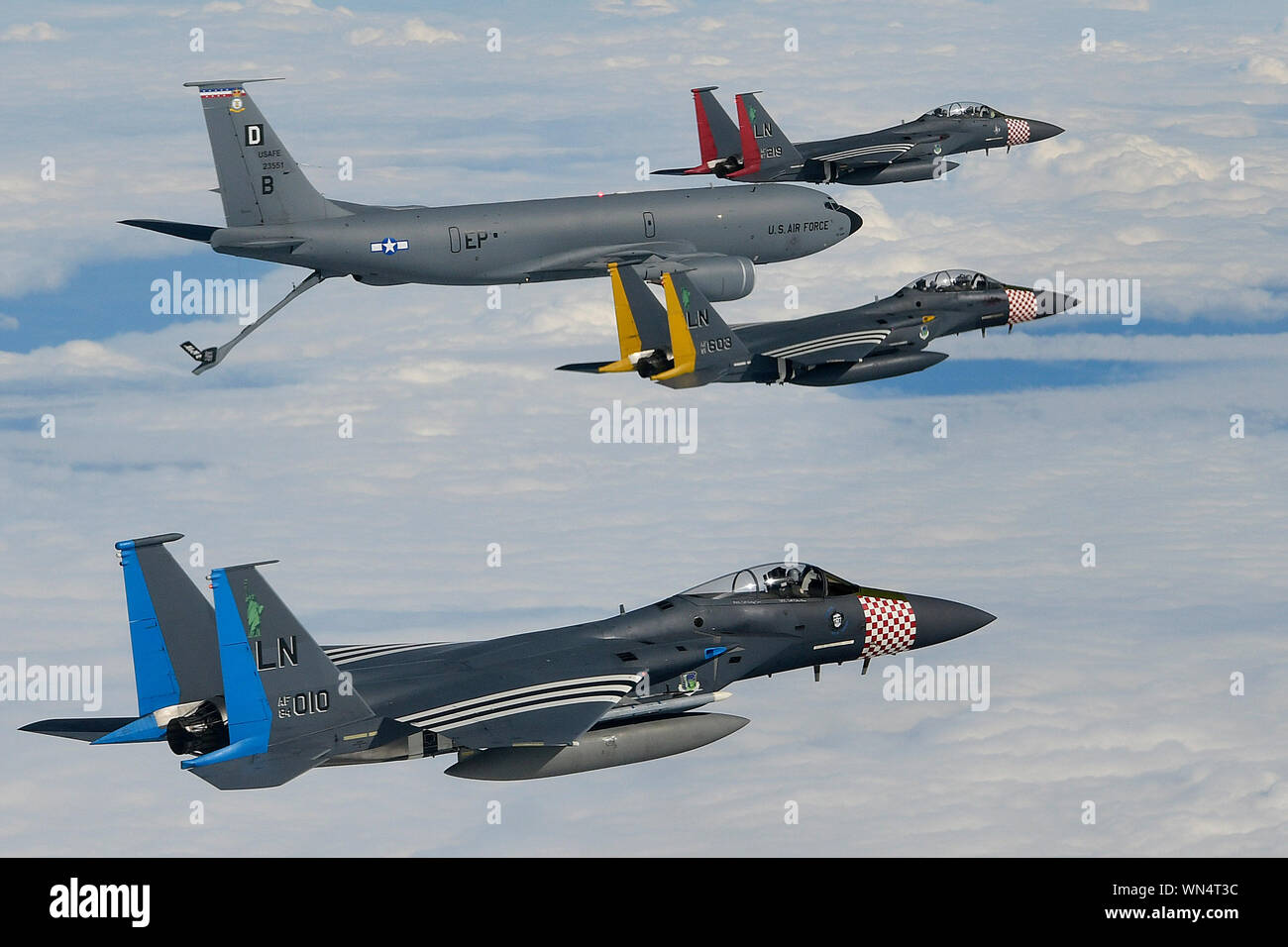 An F-15C Eagle and two F-15E Strike Eagles assigned to the 48th Fighter ...