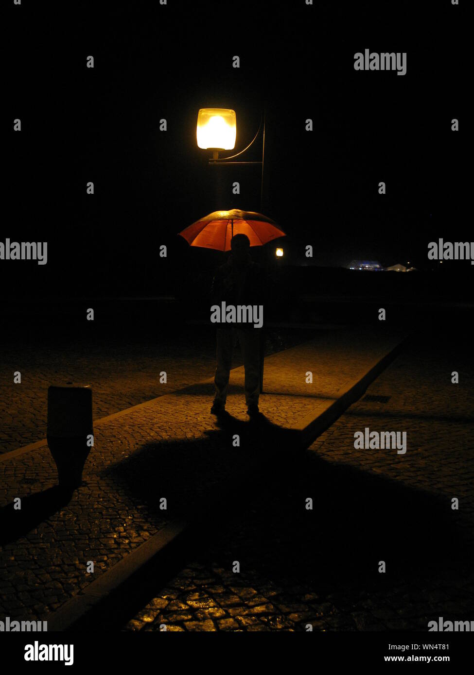Man lamp post shadow hi-res stock photography and images - Alamy