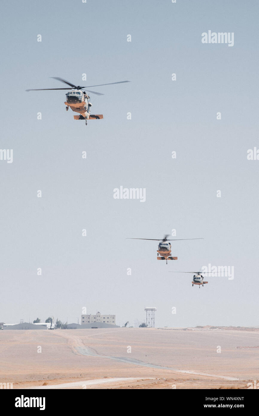 Jordanian helicopters depart from a training mission carrying U.S. Air ...