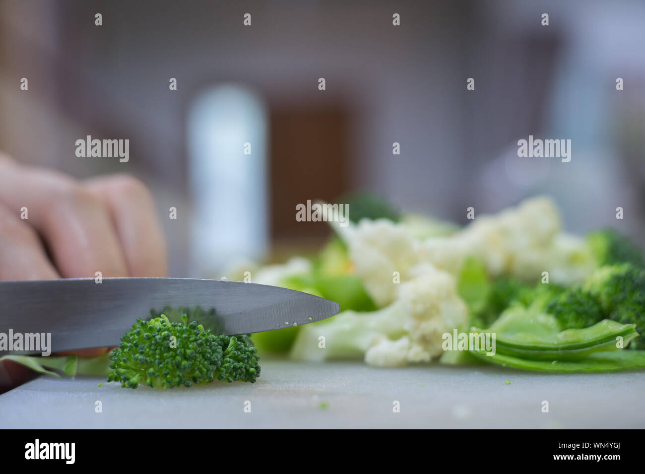 Cutting vegetables kitchen hi-res stock photography and images - Alamy