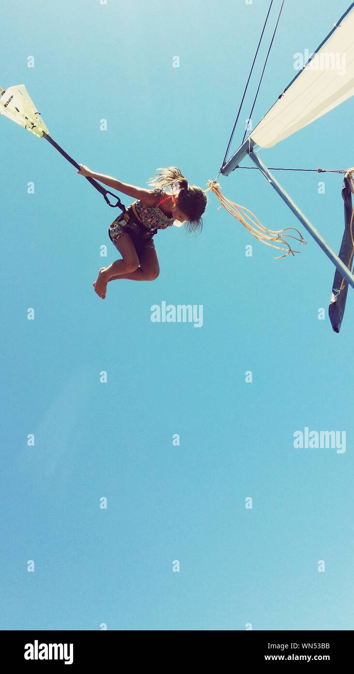 Blue trampoline hi-res stock photography and images - Alamy