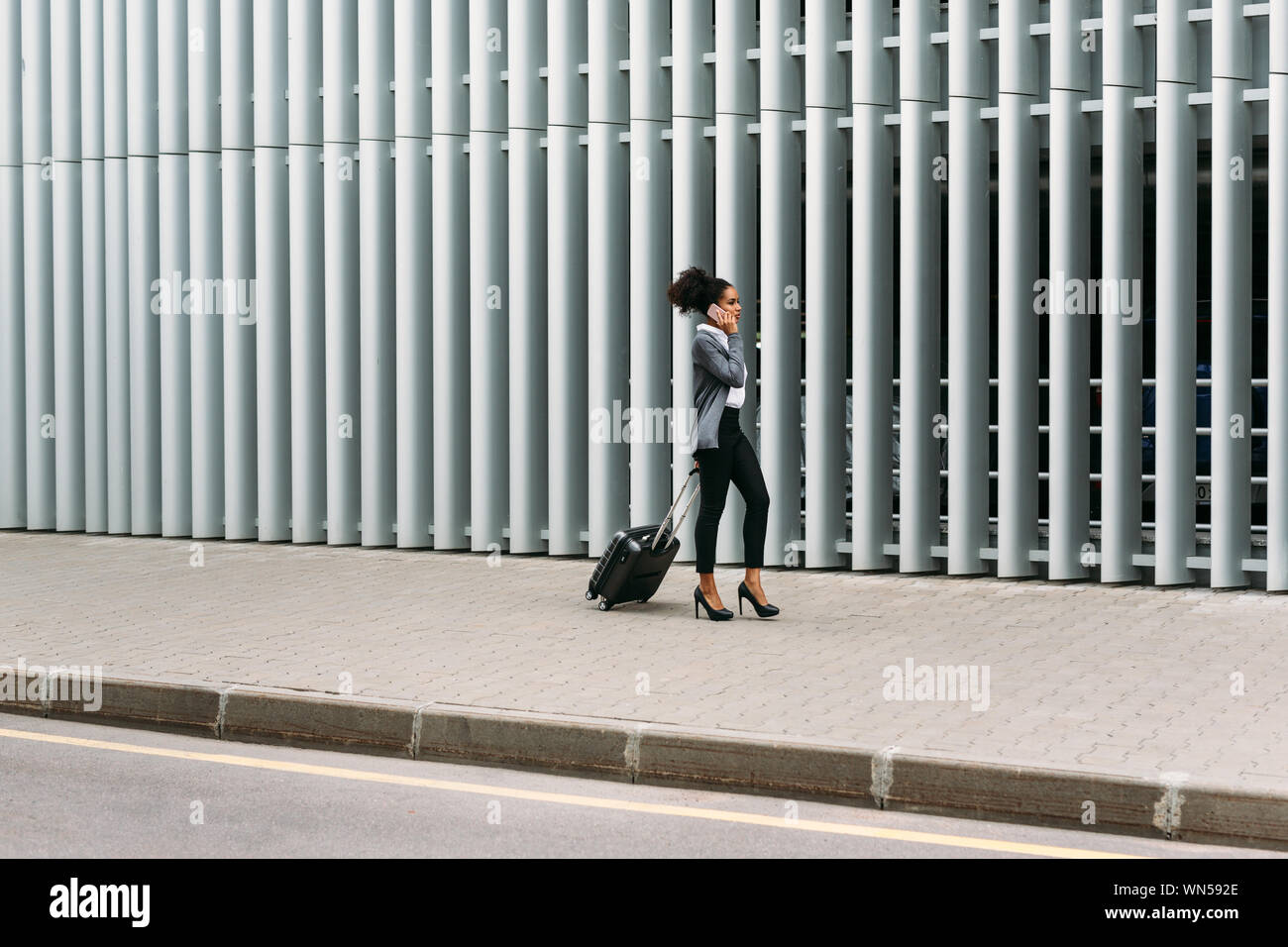 Women walking in high heels hi-res stock photography and images - Alamy
