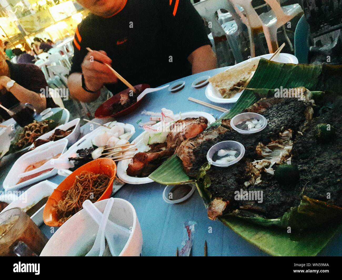 Two men eating restaurant hi-res stock photography and images - Alamy