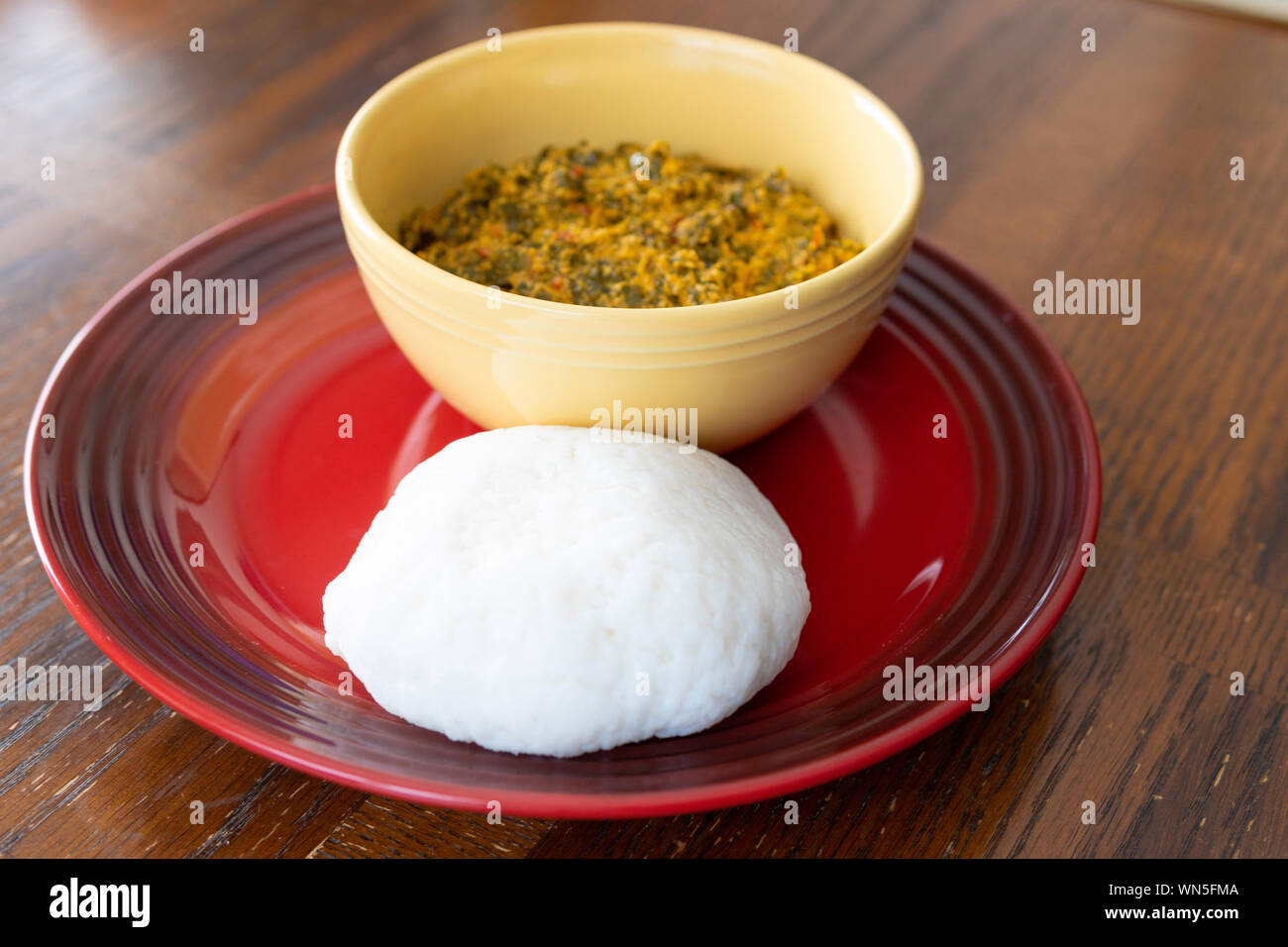 Nigerian Egusi Soup served with Tuwo Shinkafa Stock Photo - Alamy