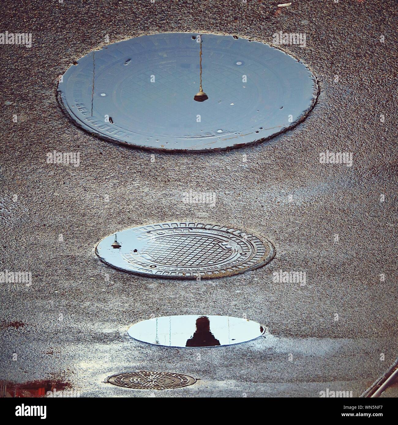 Manholes High Resolution Stock Photography and Images - Alamy