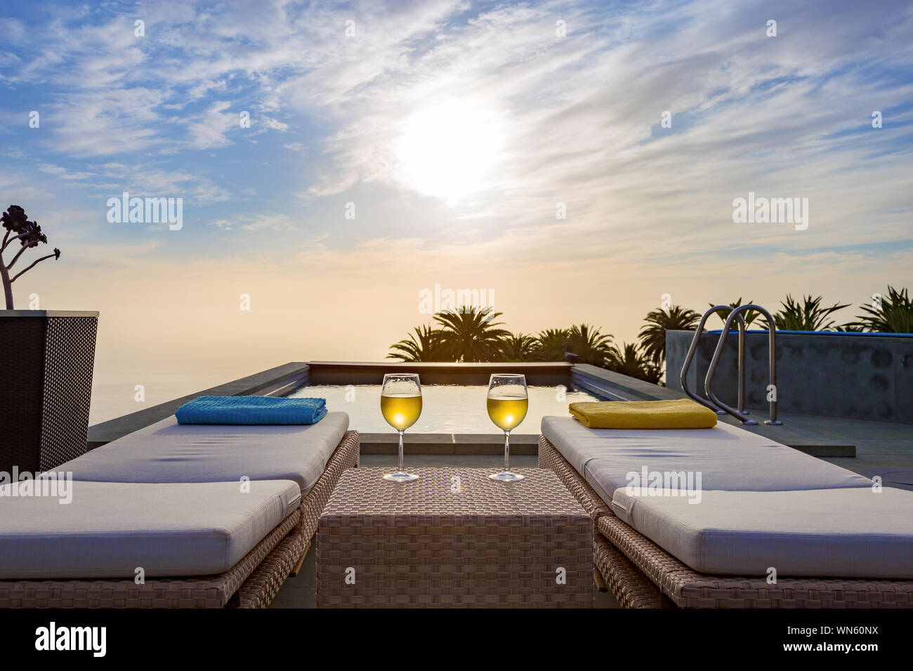 Lounger sunset luxury pool islands hi-res stock photography and images ...