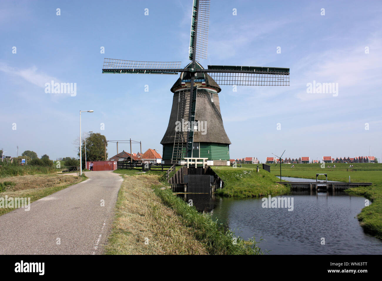 A windmill in Volendam. Nowadays, windmills around the Netherlands are ...