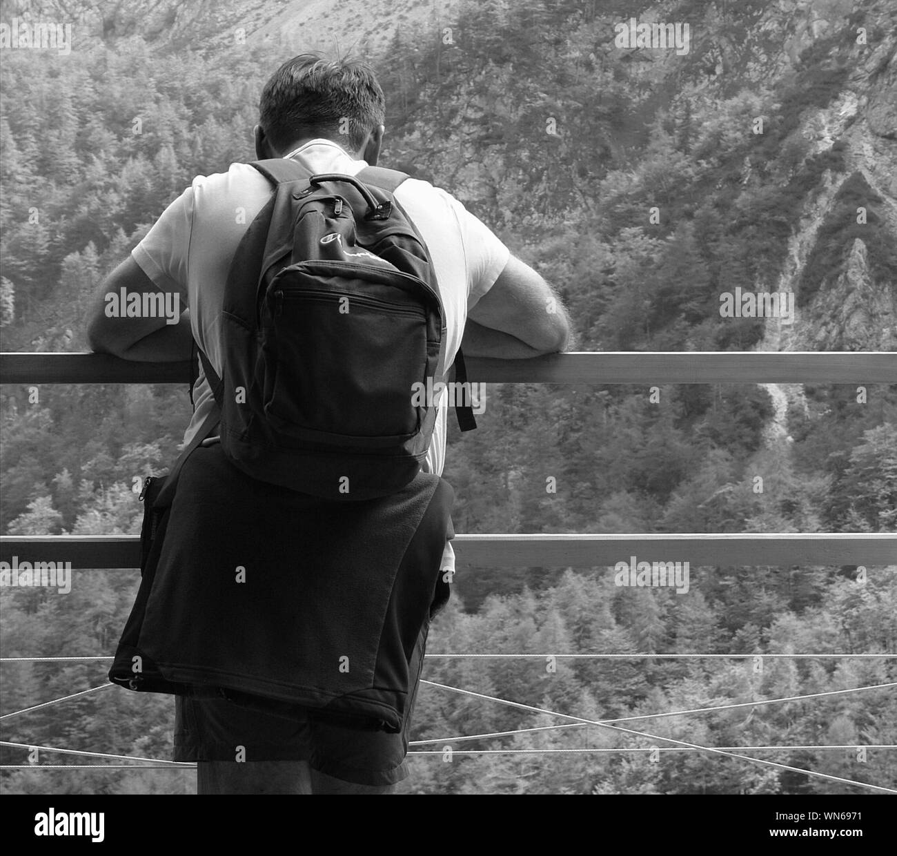 Mature man standing rear view Black and White Stock Photos & Images - Alamy