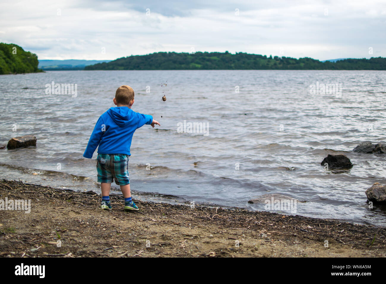 Throwing Rock In Water High Resolution Stock Photography and Images - Alamy