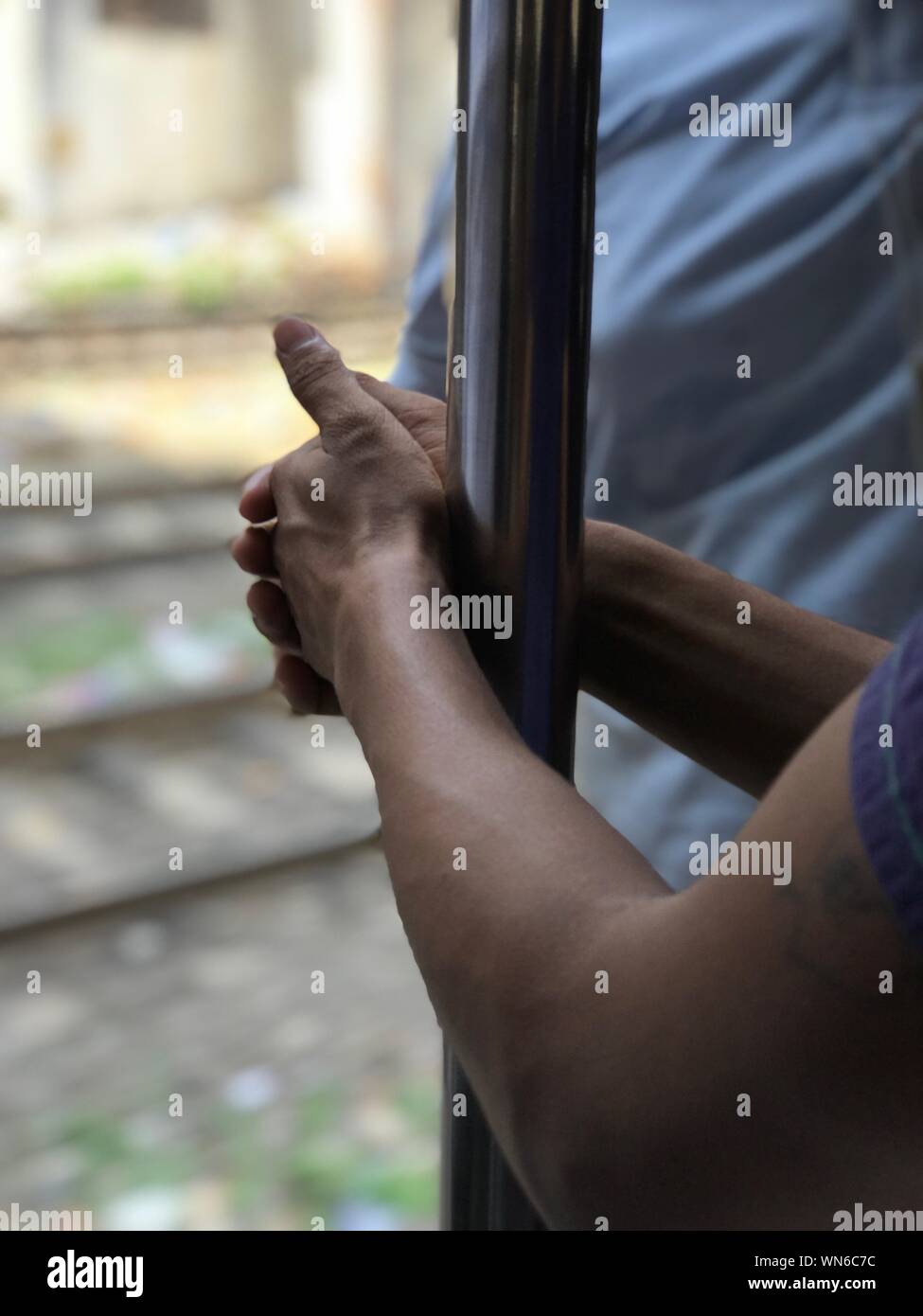 Close up hand holding pole hi-res stock photography and images - Alamy