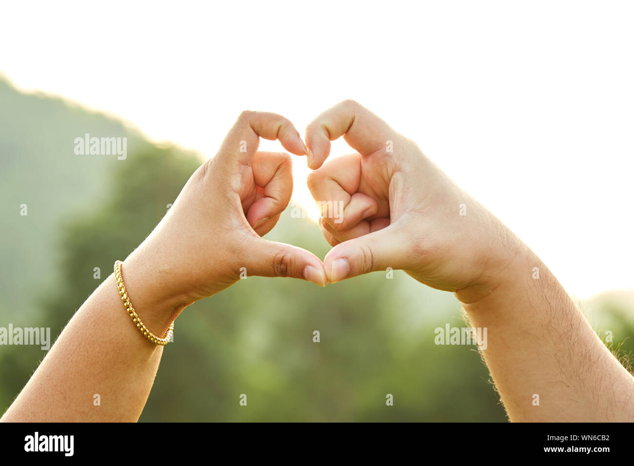 Couple heart hands close up hi-res stock photography and images - Alamy