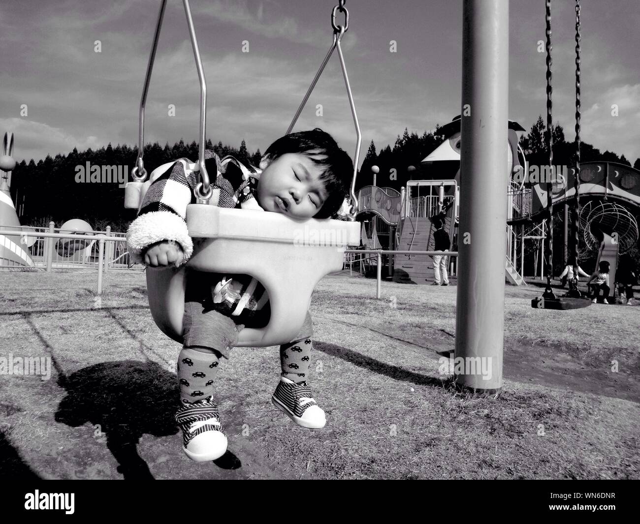 Baby Boy In Baby Swing High Resolution Stock Photography and Images - Alamy