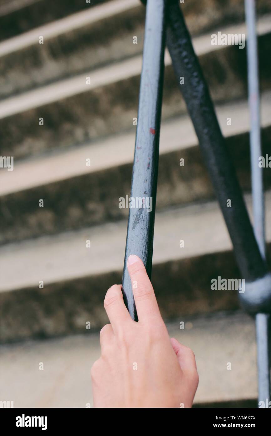 Hand holding railing hi-res stock photography and images - Alamy