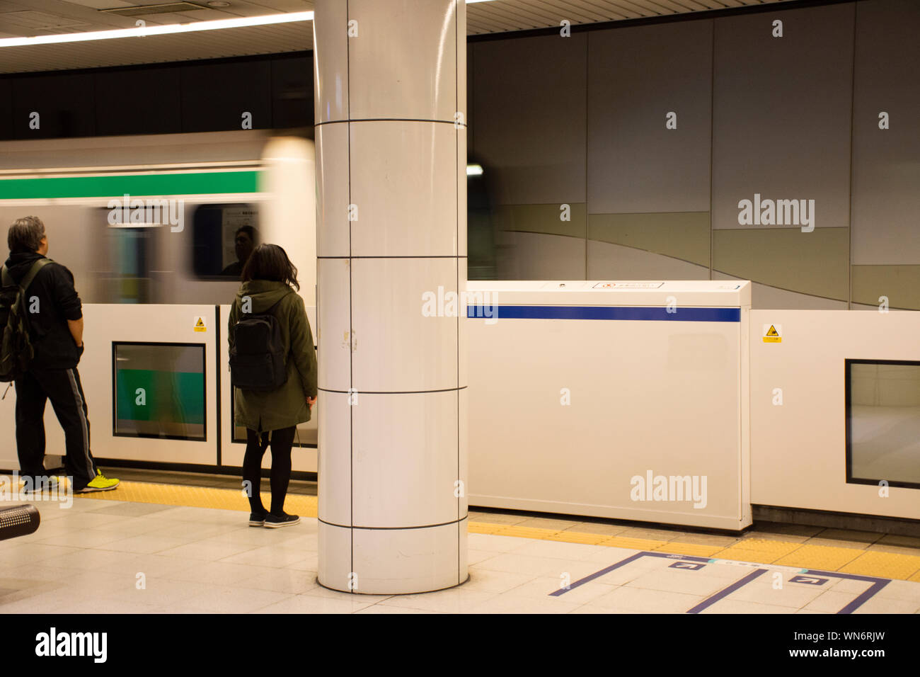 Japanese people and foreign travelers passengers waiting and journey ...
