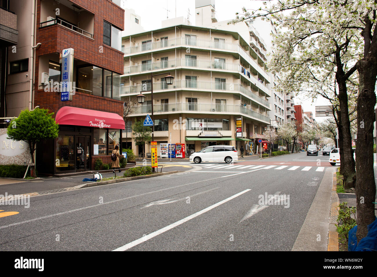 View landscape and cityscape with japanese people beside traffic road ...
