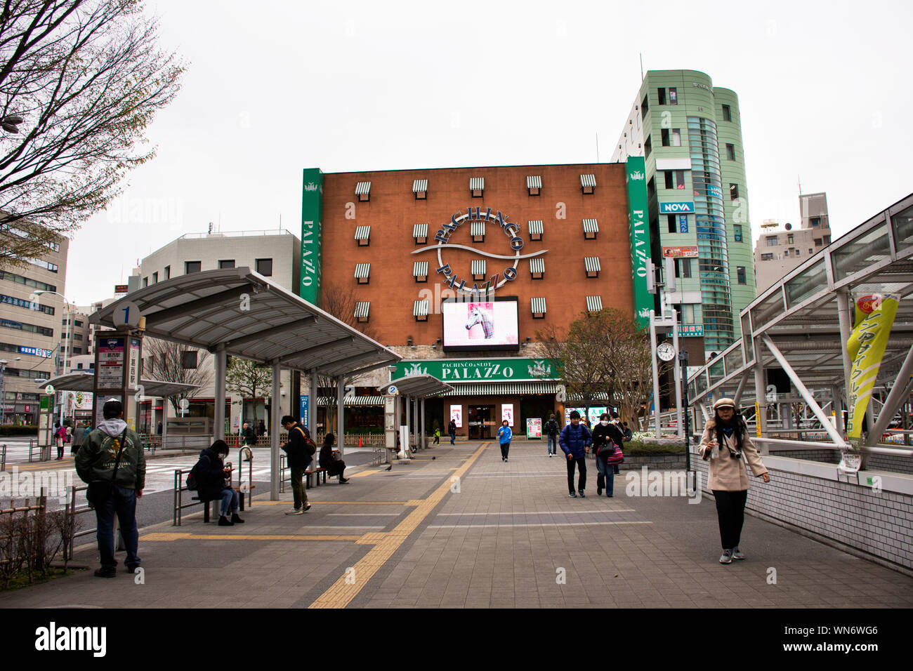 Landscape and cityscape with japanese and foreigners people wait and ...