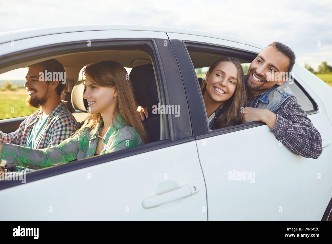 Happy people with car hi-res stock photography and images - Alamy