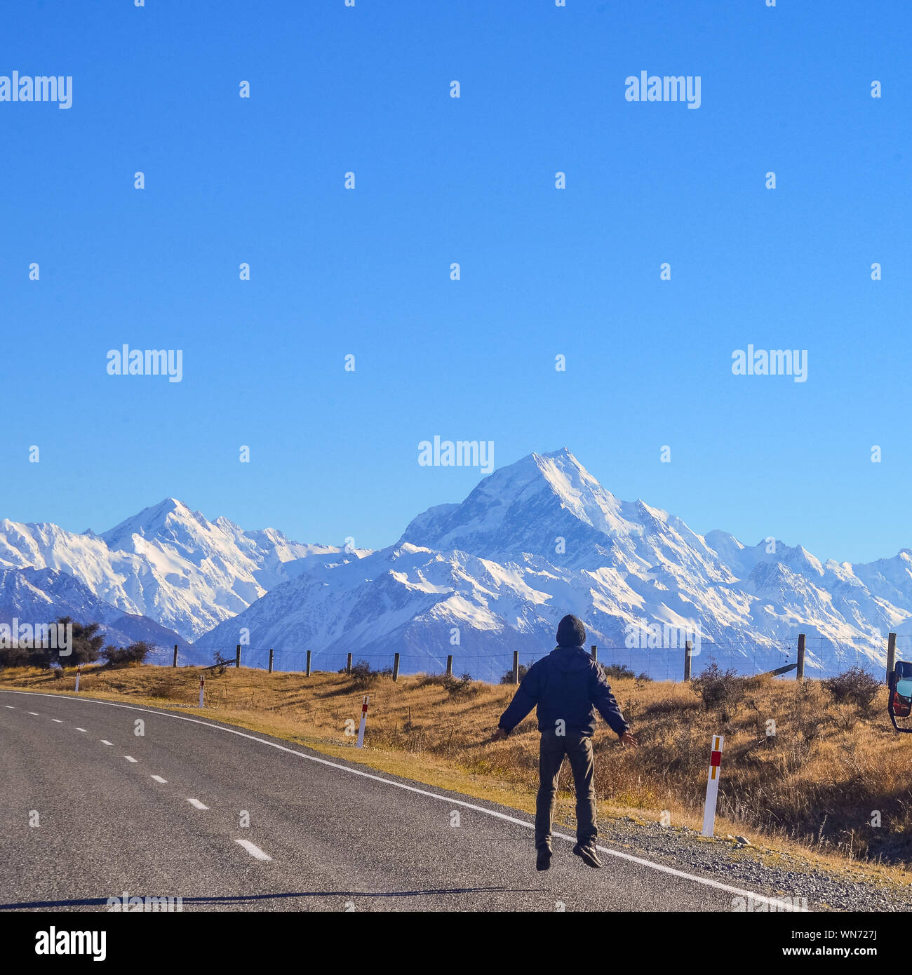 Man looking over fence hi-res stock photography and images - Alamy