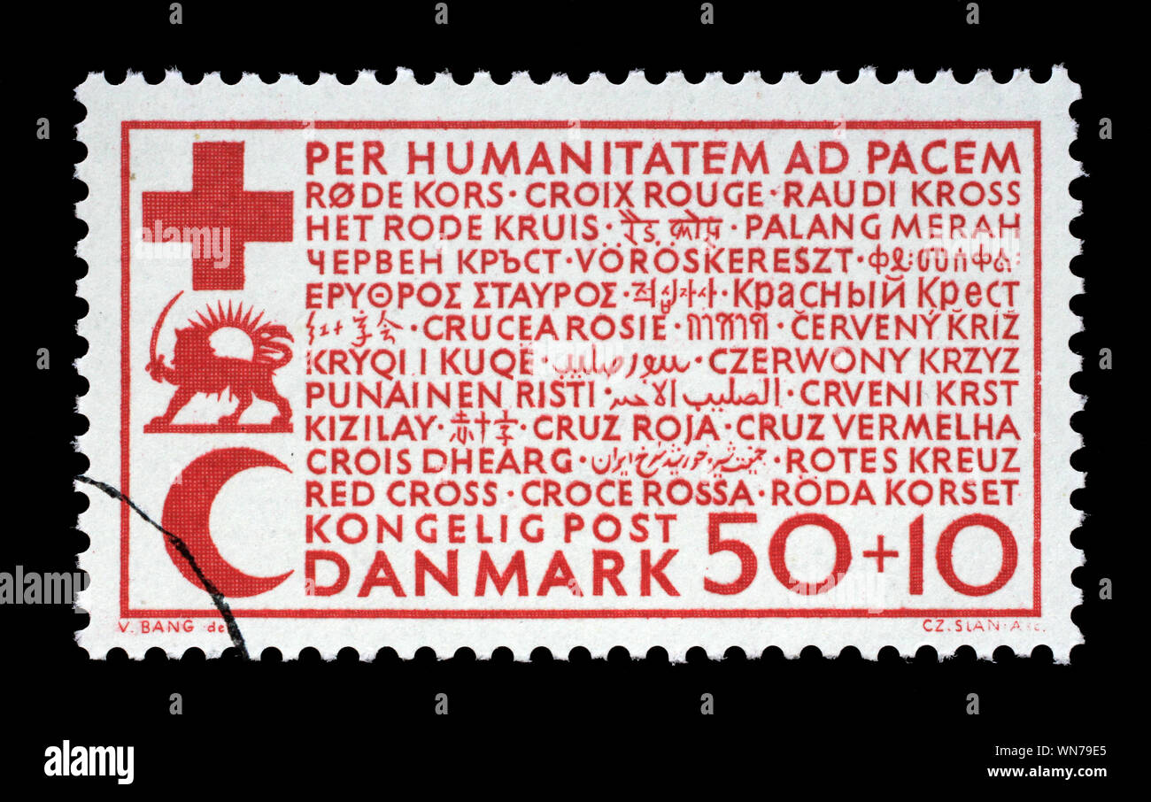 Stamp printed in Denmark shows Red Cross and Red Crescent, circa 1966 ...