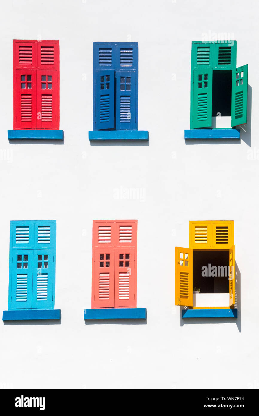 Colourful windows on a building in SIngapore Stock Photo - Alamy