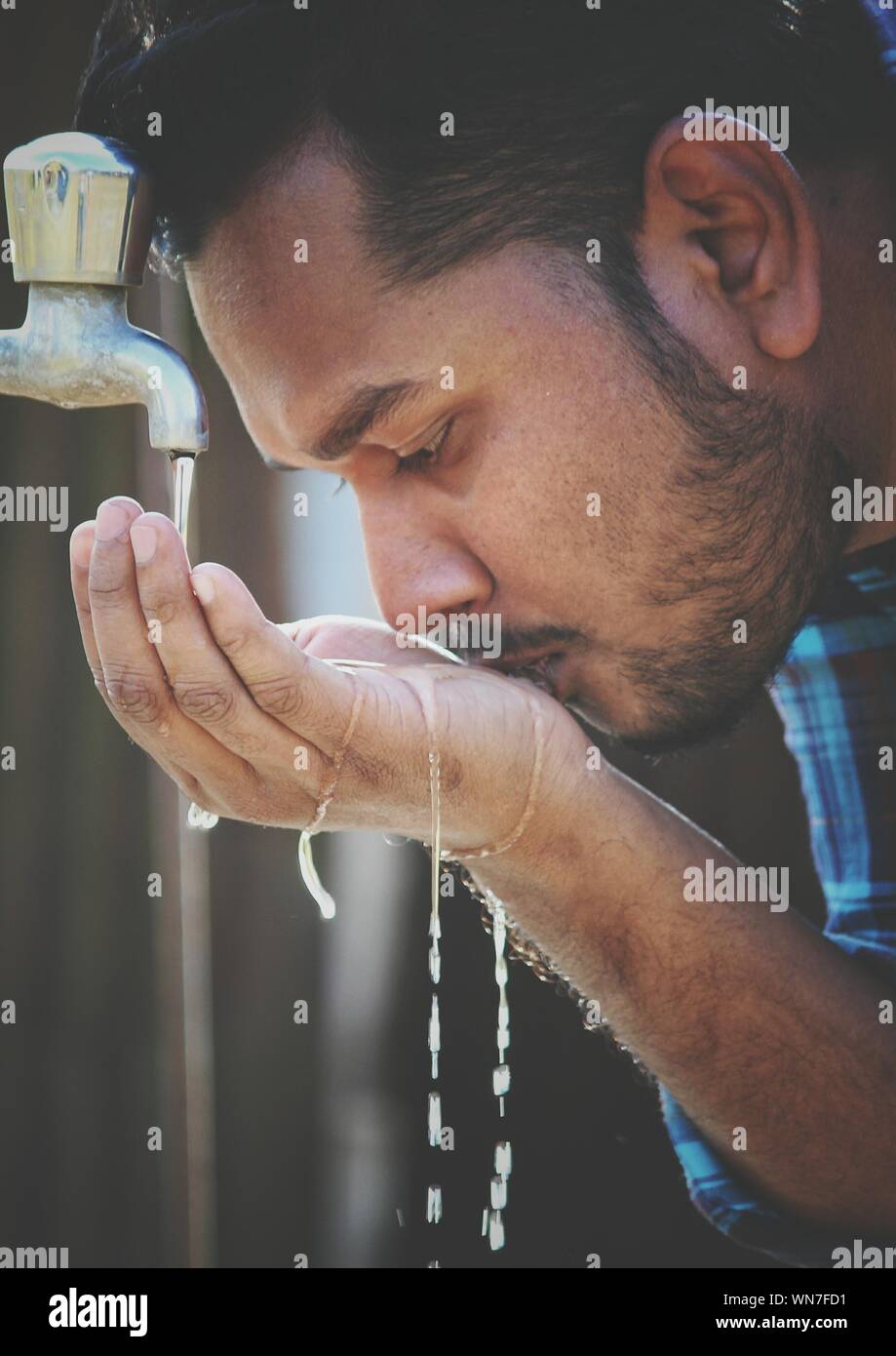 Water tap india hi-res stock photography and images - Alamy