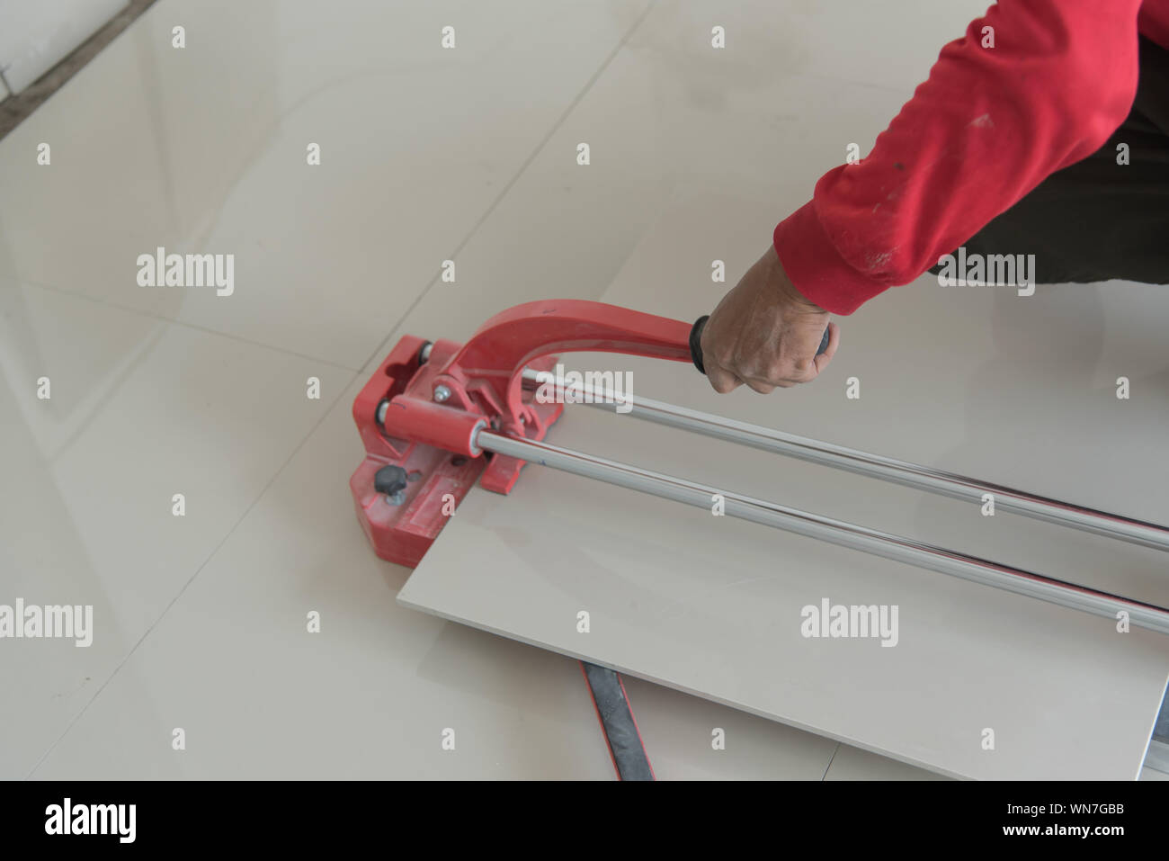 Installing floor tile hi-res stock photography and images - Alamy