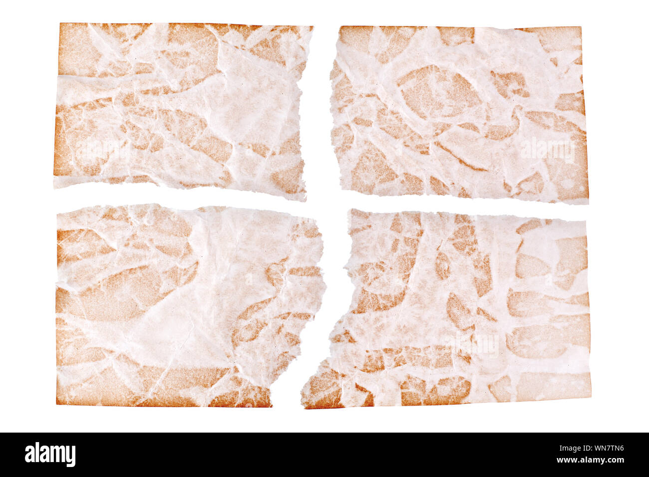 Torn sheets of brown aged paper on white background isolated close up ...