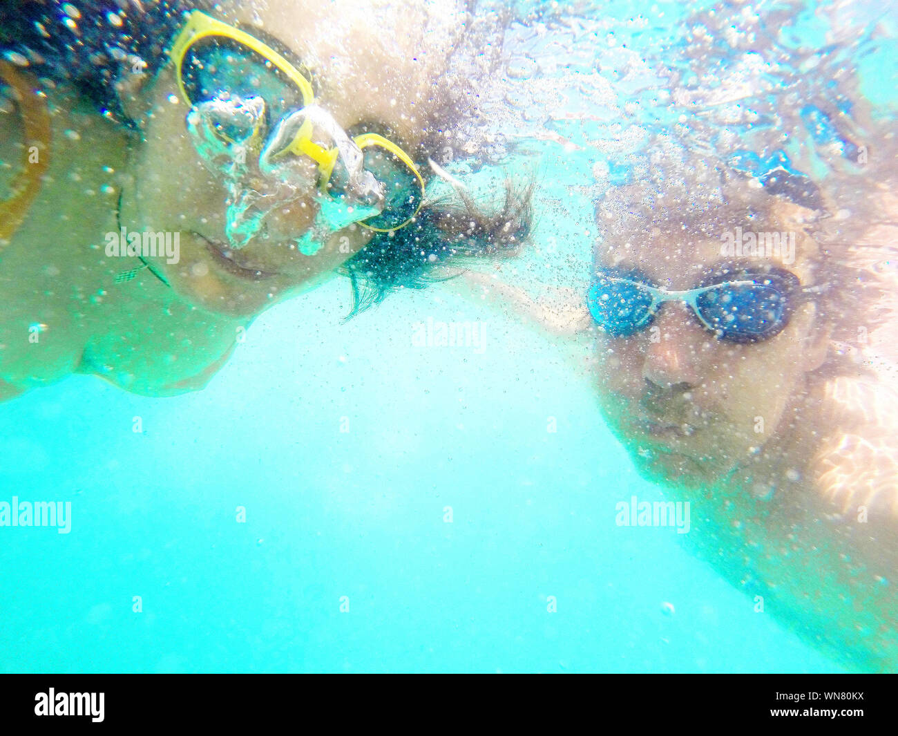 Two Women Swimming Underwater High Resolution Stock Photography and ...