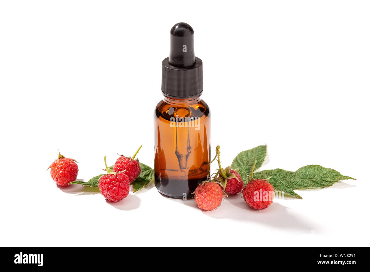 Raspberry essential oil isolated on white background. Rubus idaeus oil ...