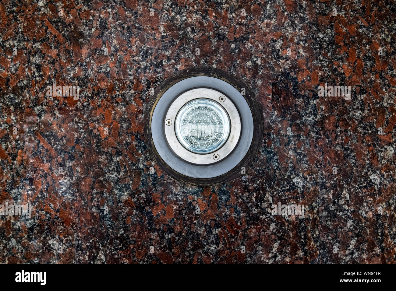 LED backlight in granite stone. Light fixture Stock Photo - Alamy