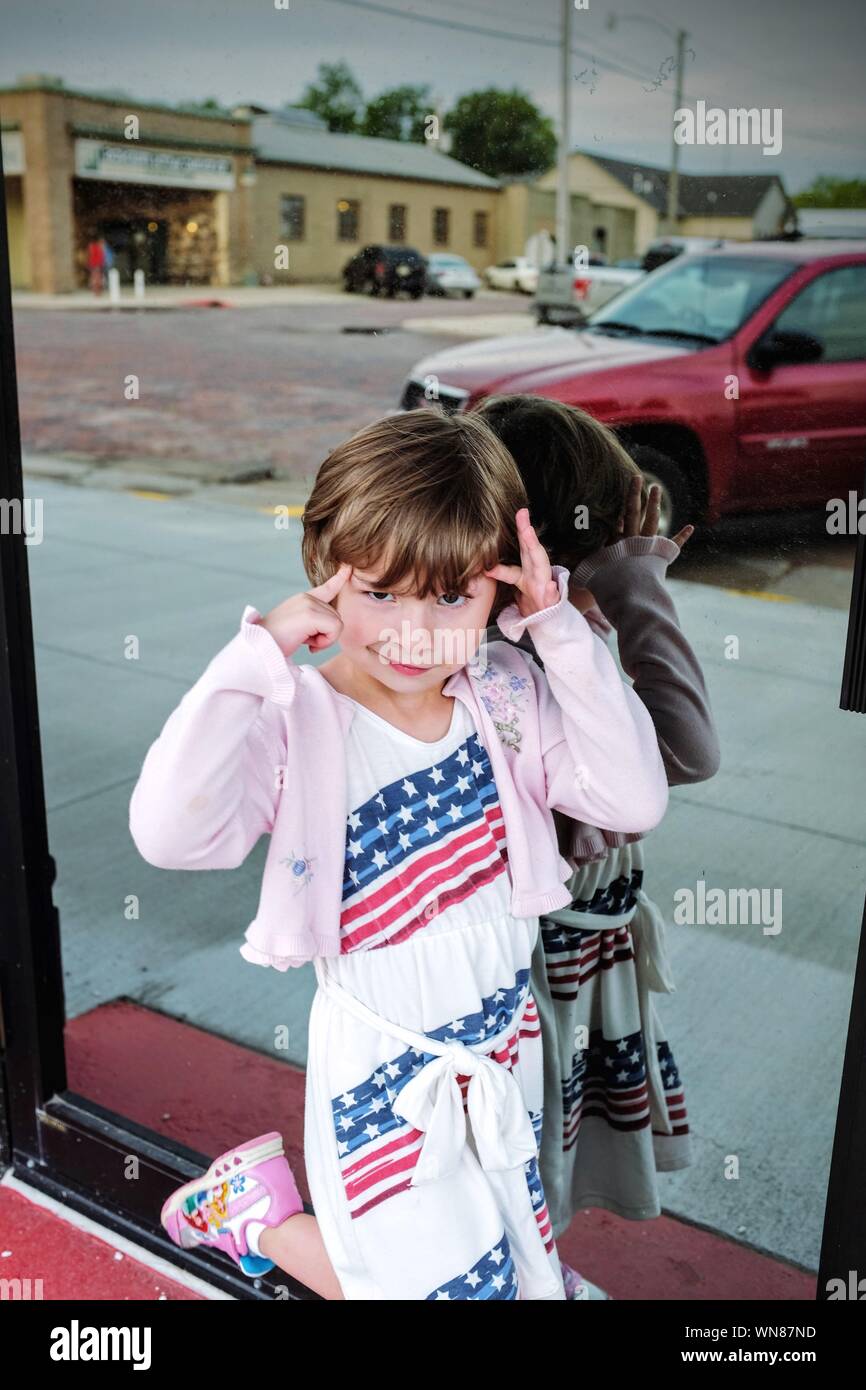 Face against glass hi-res stock photography and images - Alamy