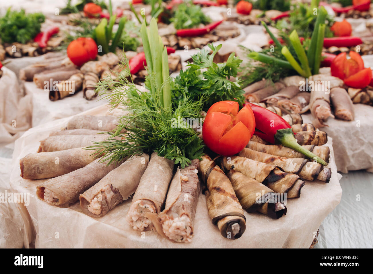 Huge plate serving appetizing meat snack and vegetable ready for eating ...