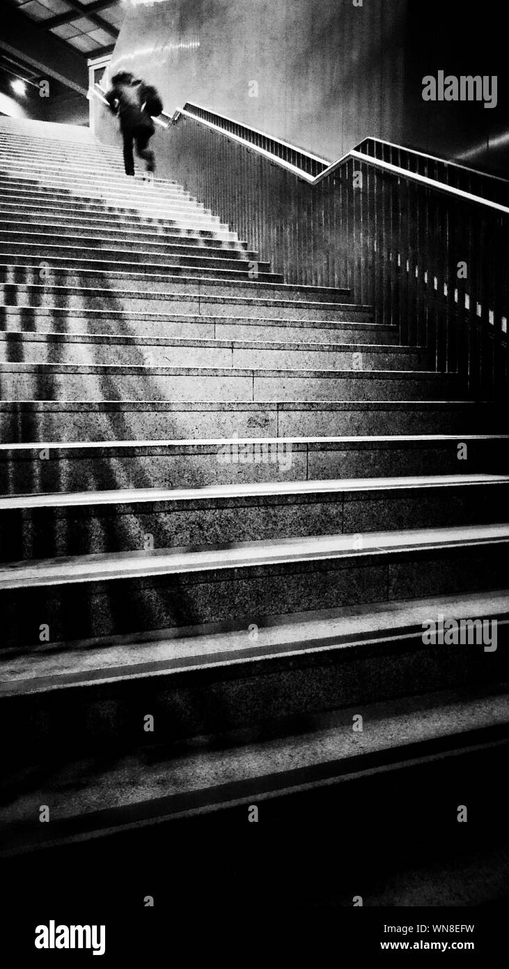 Rear view climbing stairs hi-res stock photography and images - Alamy