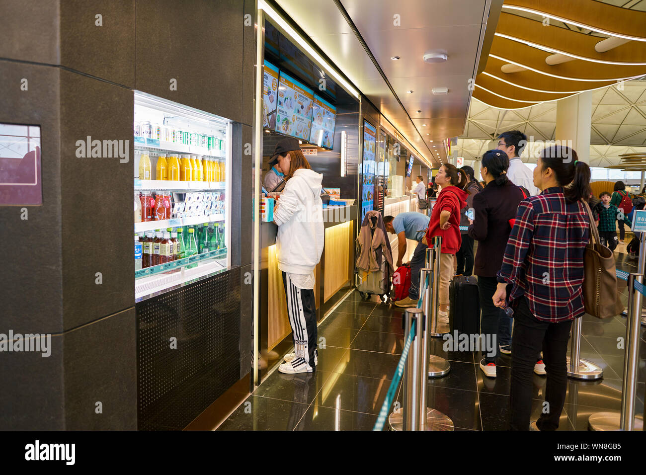 HONG KONG, CHINA - CIRCA FEBRUARY, 2019: people standing in queue at ...