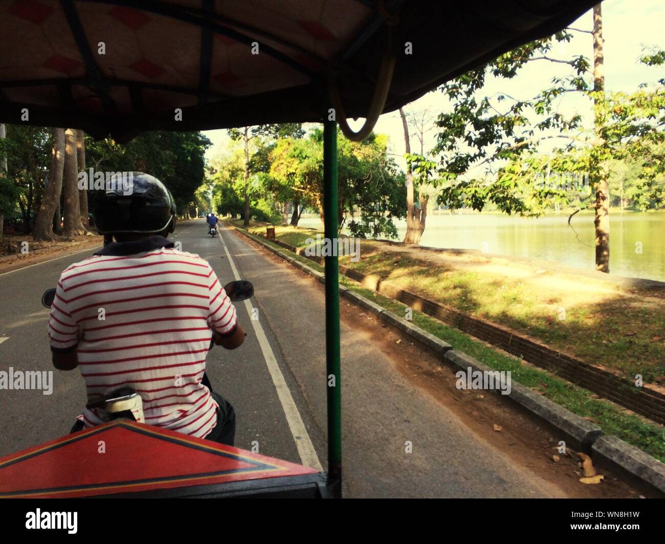 Man with tuk tuk hi-res stock photography and images - Alamy