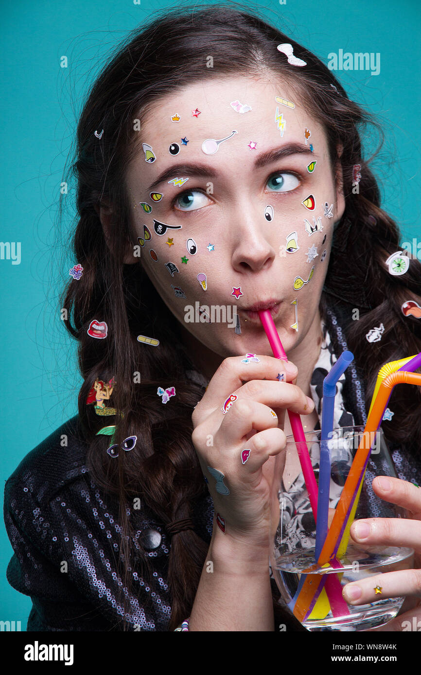 Woman with stickers on her face hi-res stock photography and images - Alamy