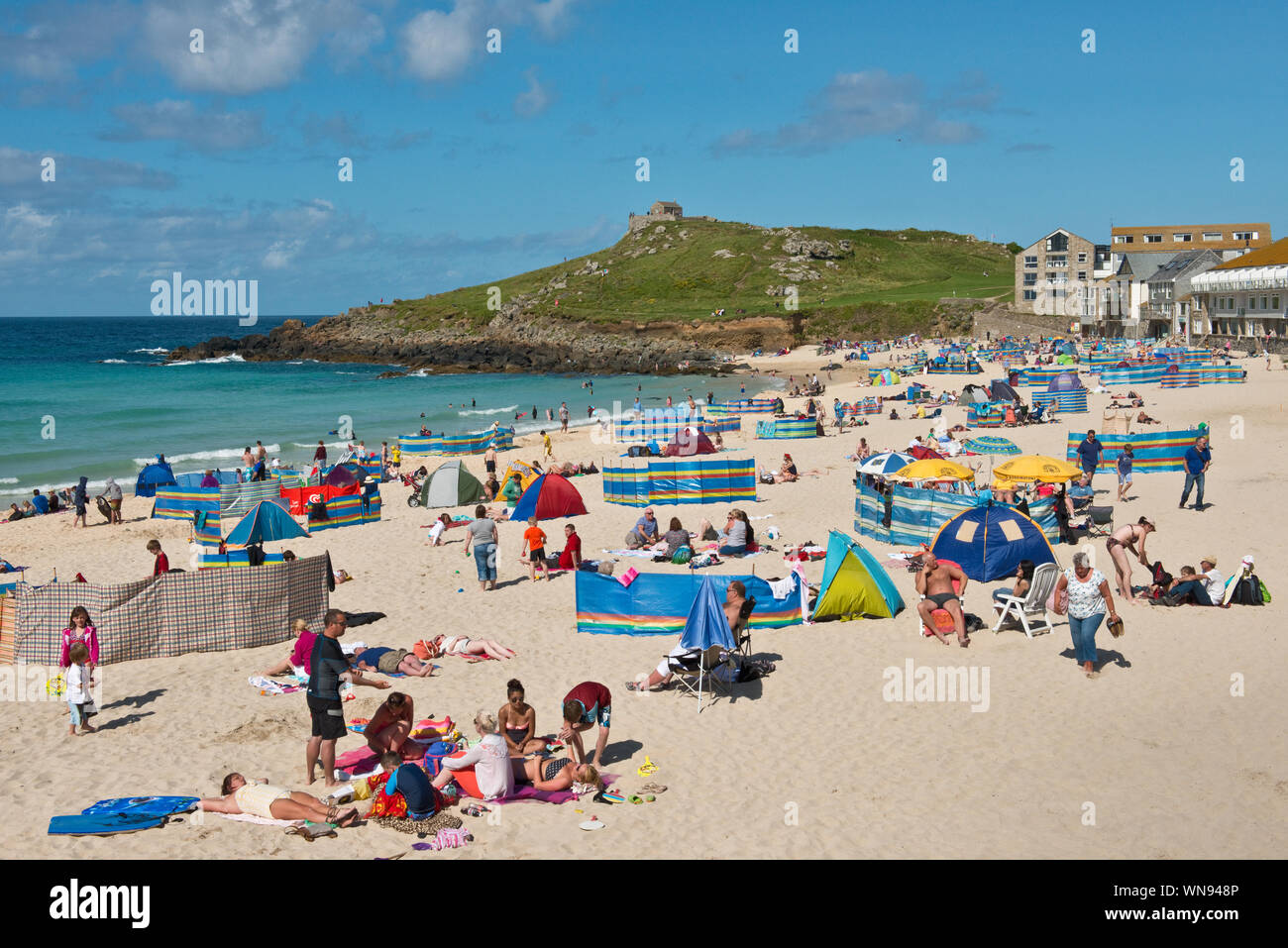 Summer crowds on Porthmeor Beach. St Ives, Cornwall, England, UK Stock ...
