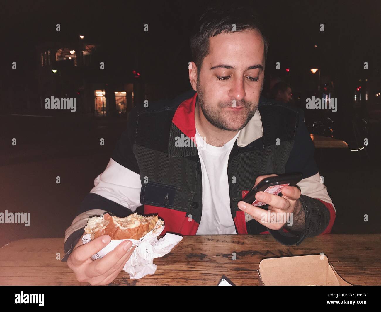 Man eating unhealthy food hi-res stock photography and images - Alamy