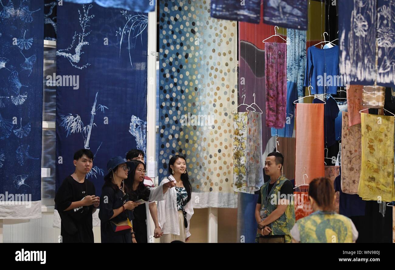 Taibei, China's Taiwan. 5th Sep, 2019. Visitors view textile exhibits ...