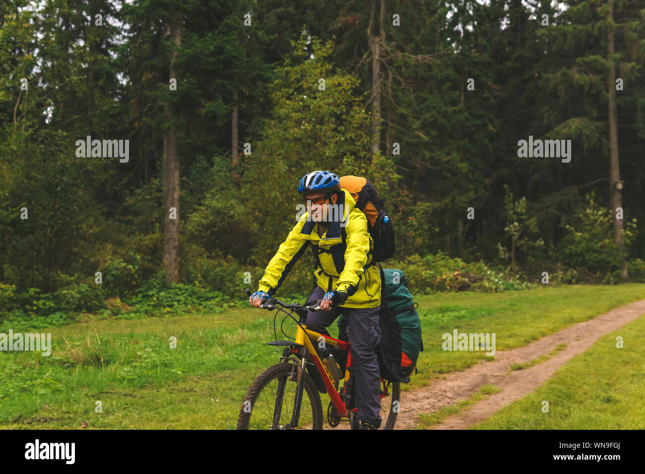 Male cyclist hiker rides hi-res stock photography and images - Alamy