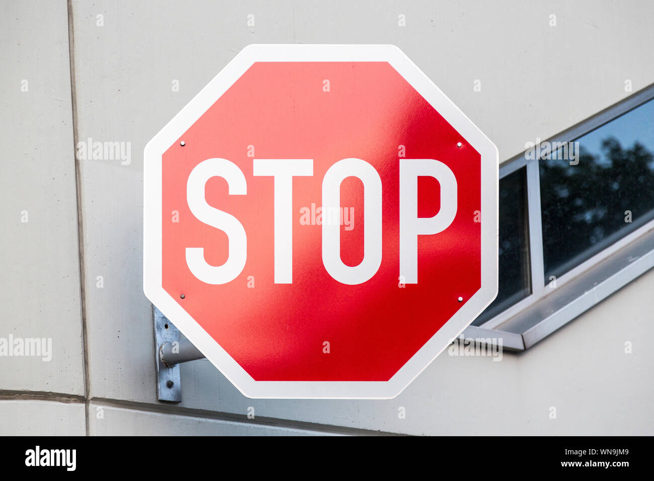 german stop sign on a concrete wall Stock Photo - Alamy
