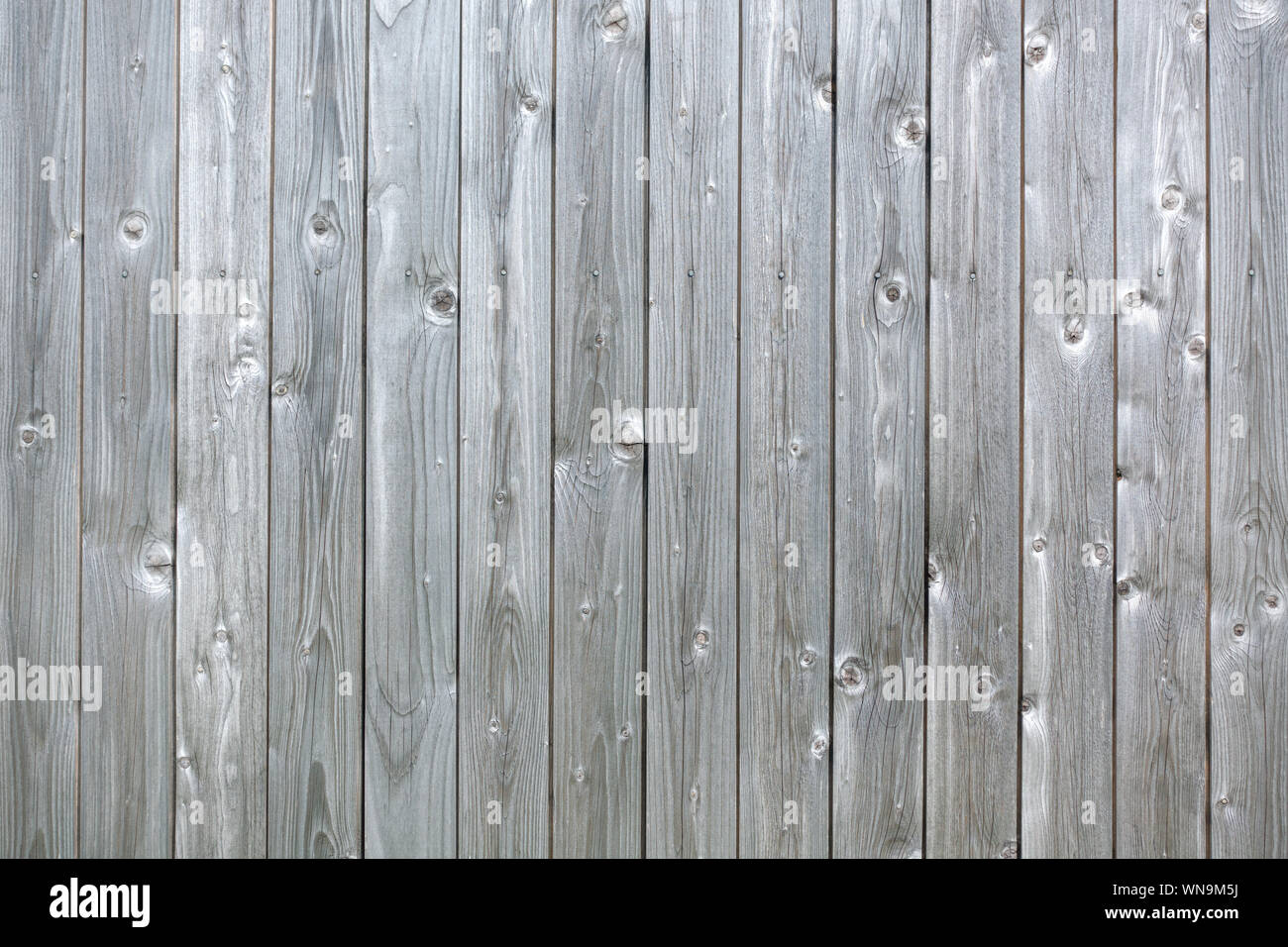 Gray wooden wall made of vertical boards Stock Photo - Alamy