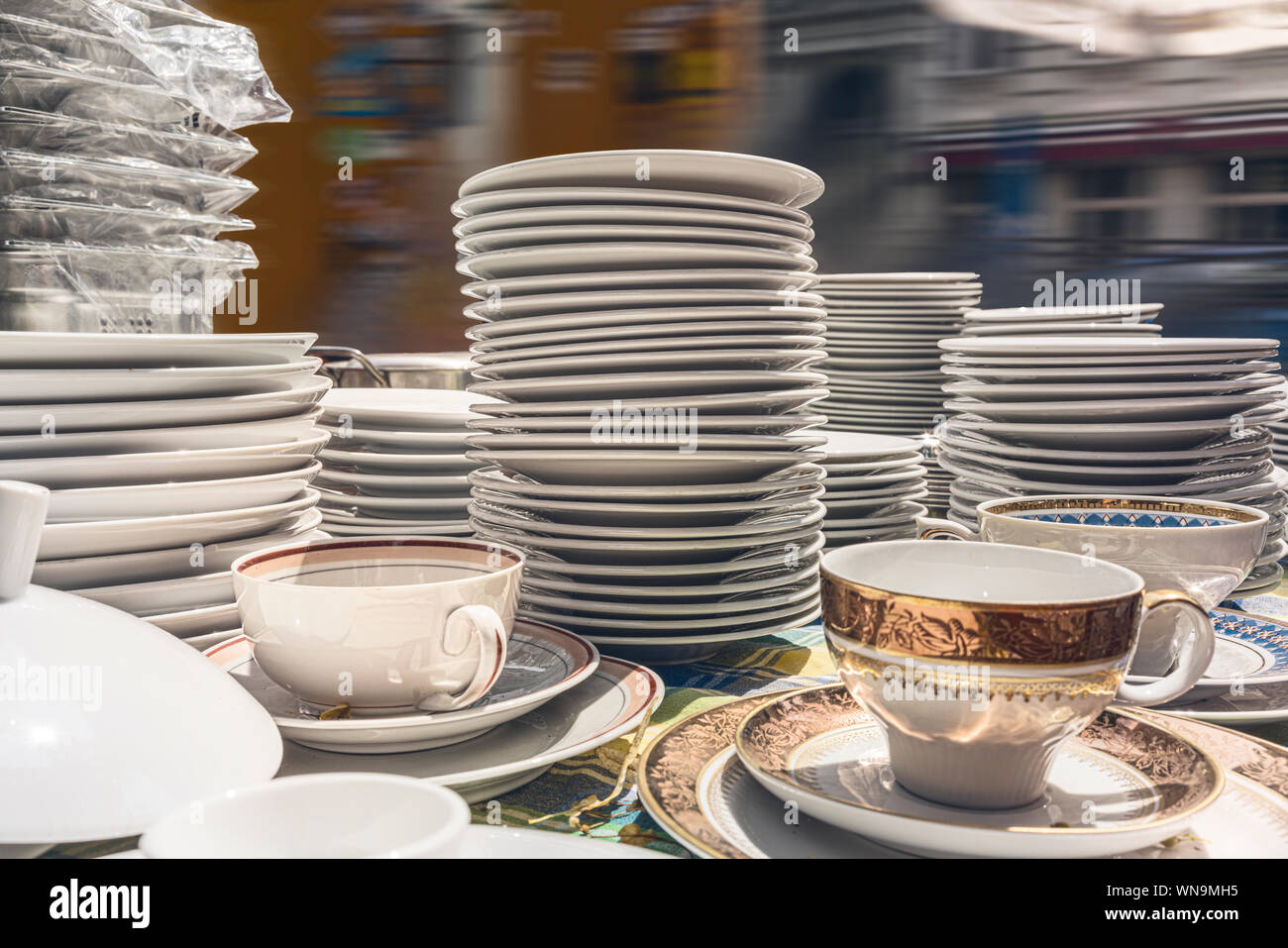 old white dishes on a flea market Stock Photo - Alamy