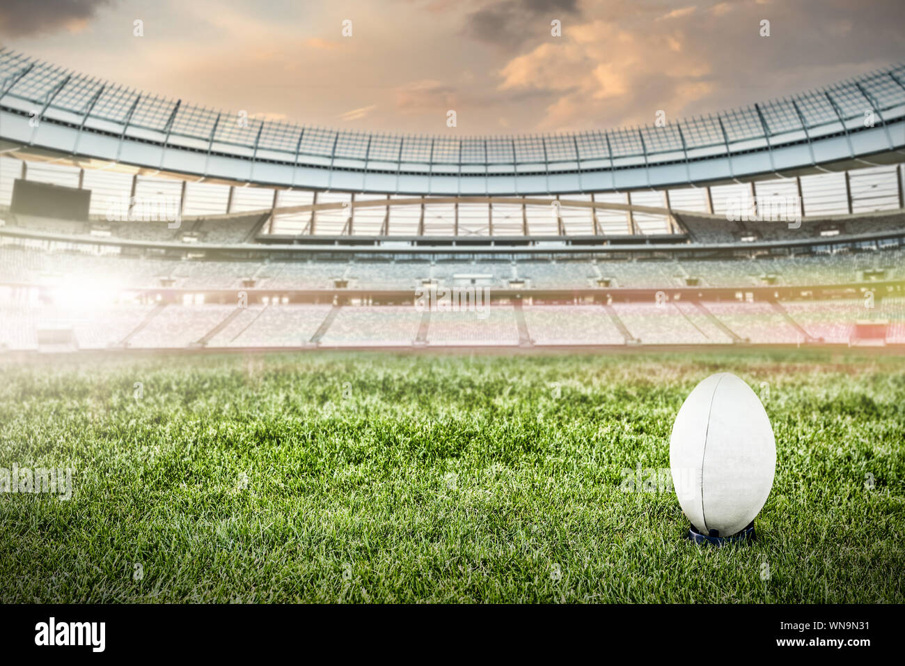 Composite image of rugby ball on the pitch Stock Photo - Alamy