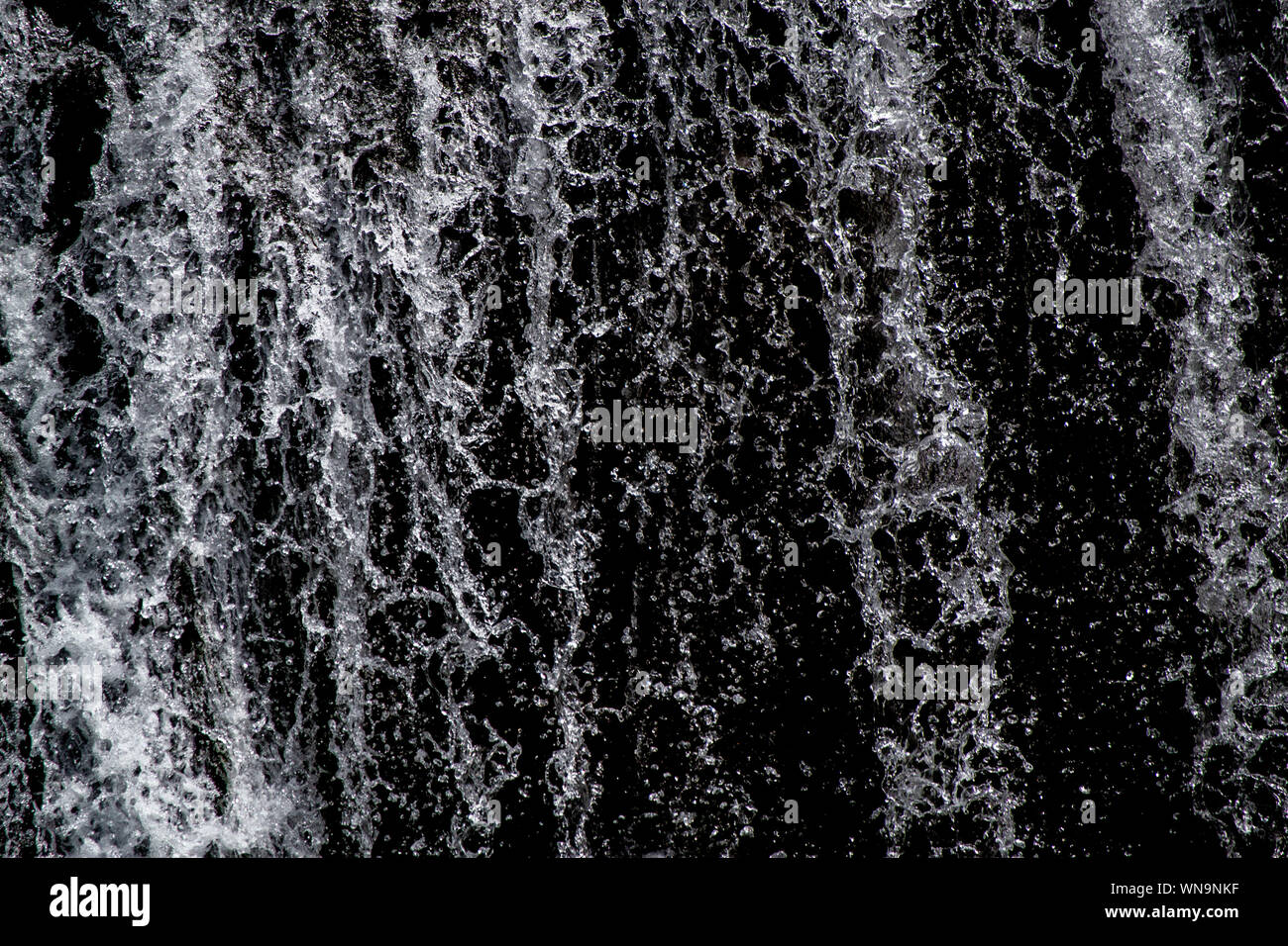 Photo of isolated waterfall on black background Stock Photo - Alamy