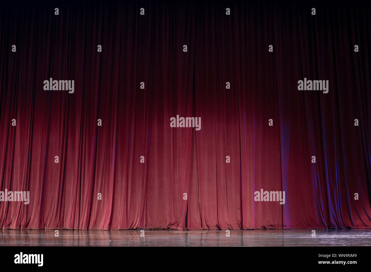 Red curtains and the wooden stage in a theater Stock Photo - Alamy