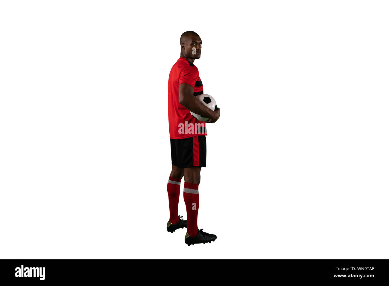 Focused Soccer Player Stock Photo - Alamy