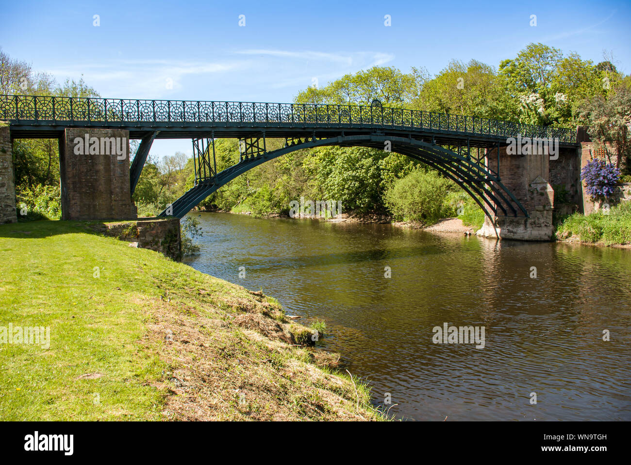 Cast iron bridge crossing the river Severn at Coalport, Shropshire ...